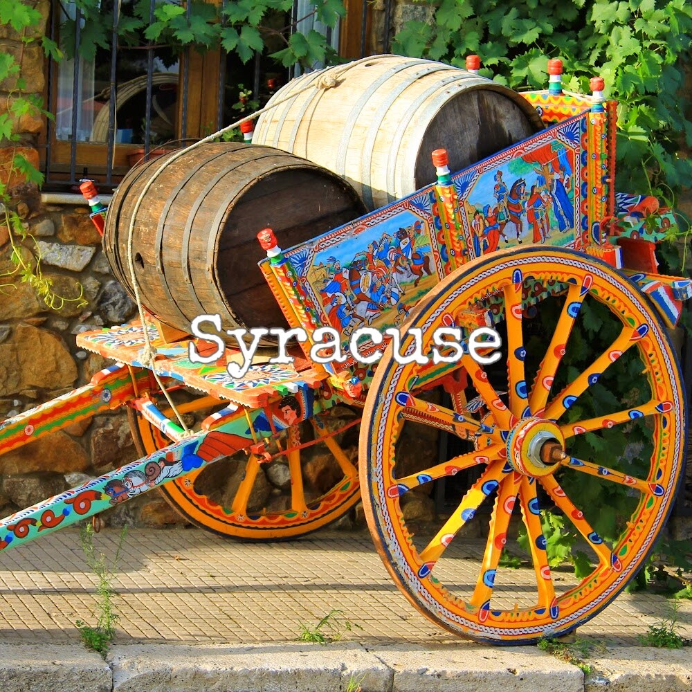 Traditional coloured sicilian cart with 2 wooden barrels | WOW! Travel Club
